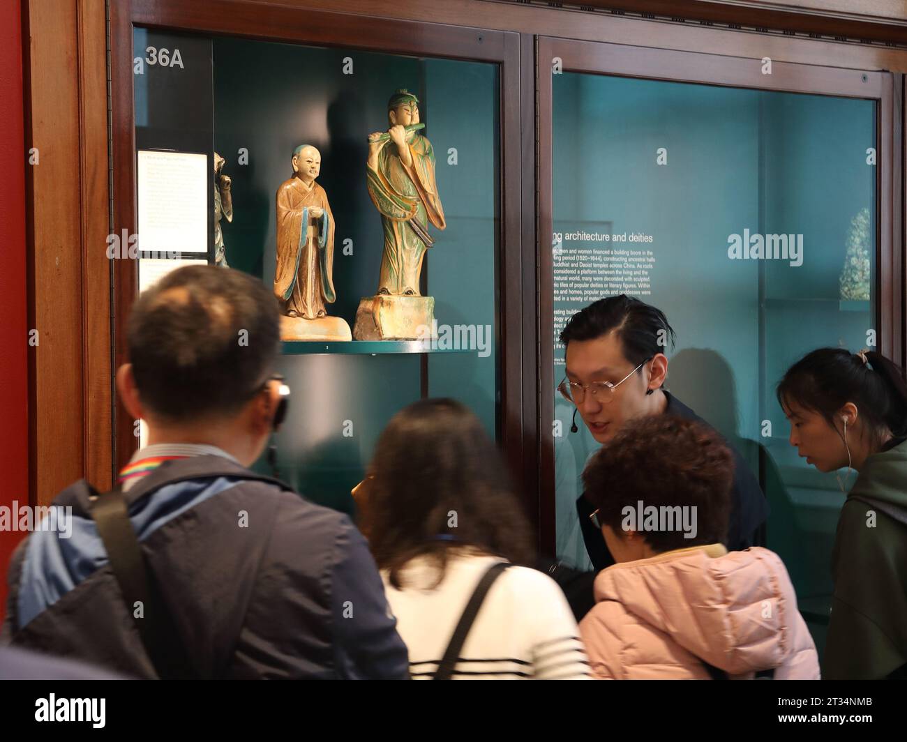 Chinese visitors study exhibits from China at the British Museum ...