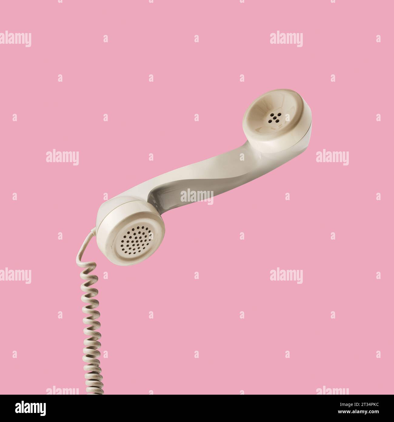 Twisted vintage telephone receiver, communication problems concept ...