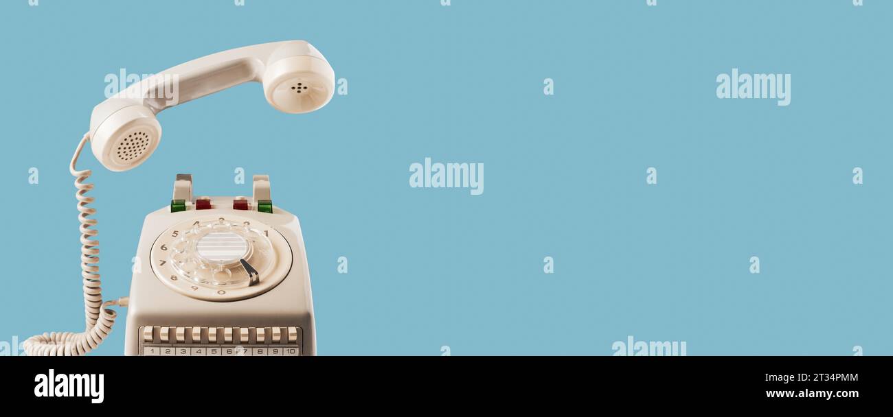 Picking up a call on a rotary dial telephone, communications concept ...