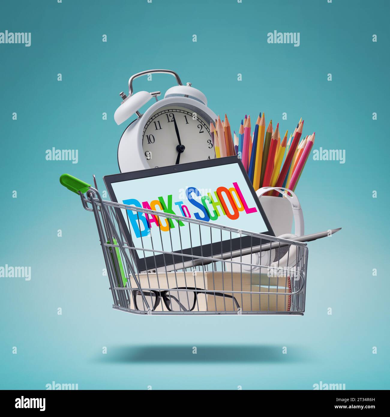Shopping cart full of school supplies, back to school shopping concept ...