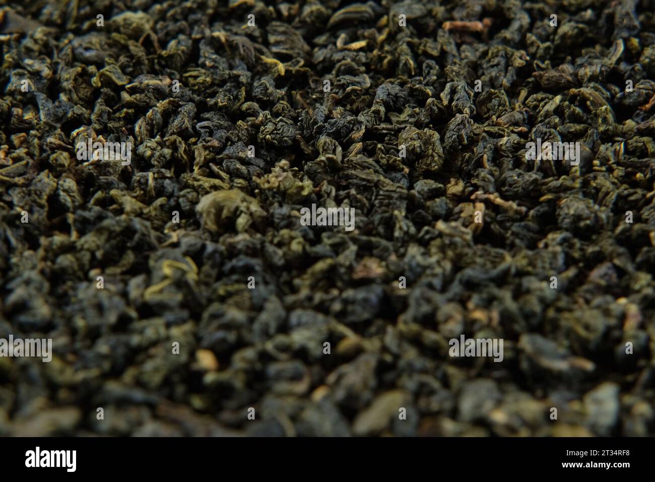 Black dry Tea Wallpaper. Mix Black and Green Tea Leaves rotating on ...