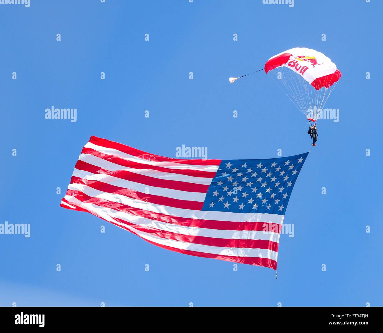 Austin, Usa . 22nd Oct, 2023. A skydiver flies the American flag over ...
