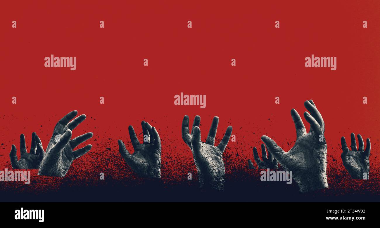 Scary zombie hands coming out of the ground, creative background with ...
