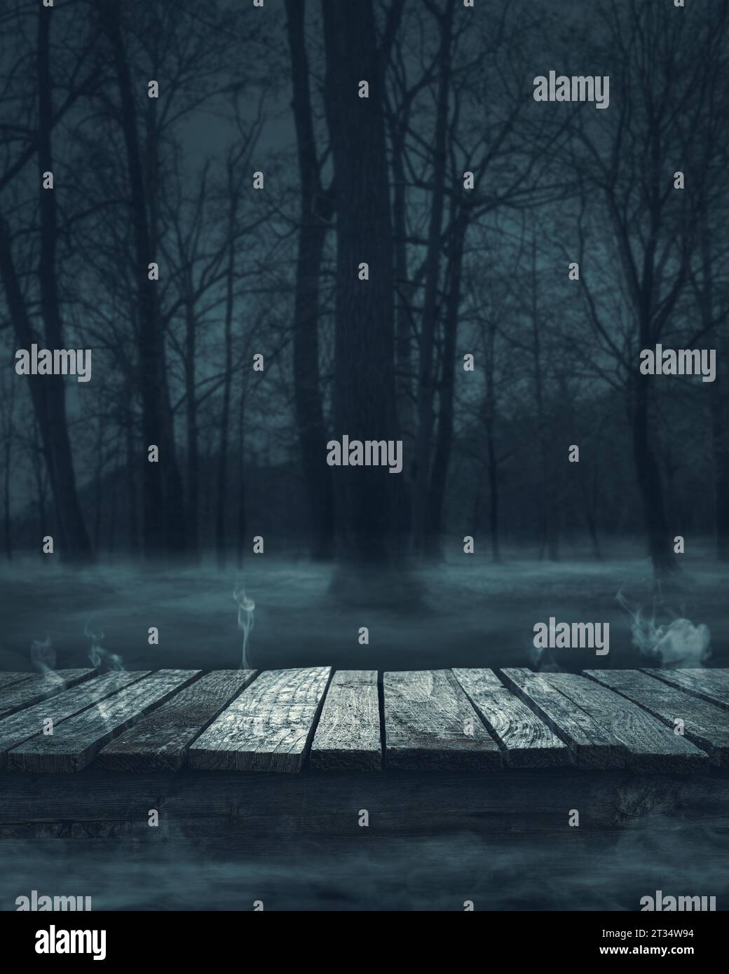 Old ruined wooden pier at the lake and moonlit misty spooky forest at ...