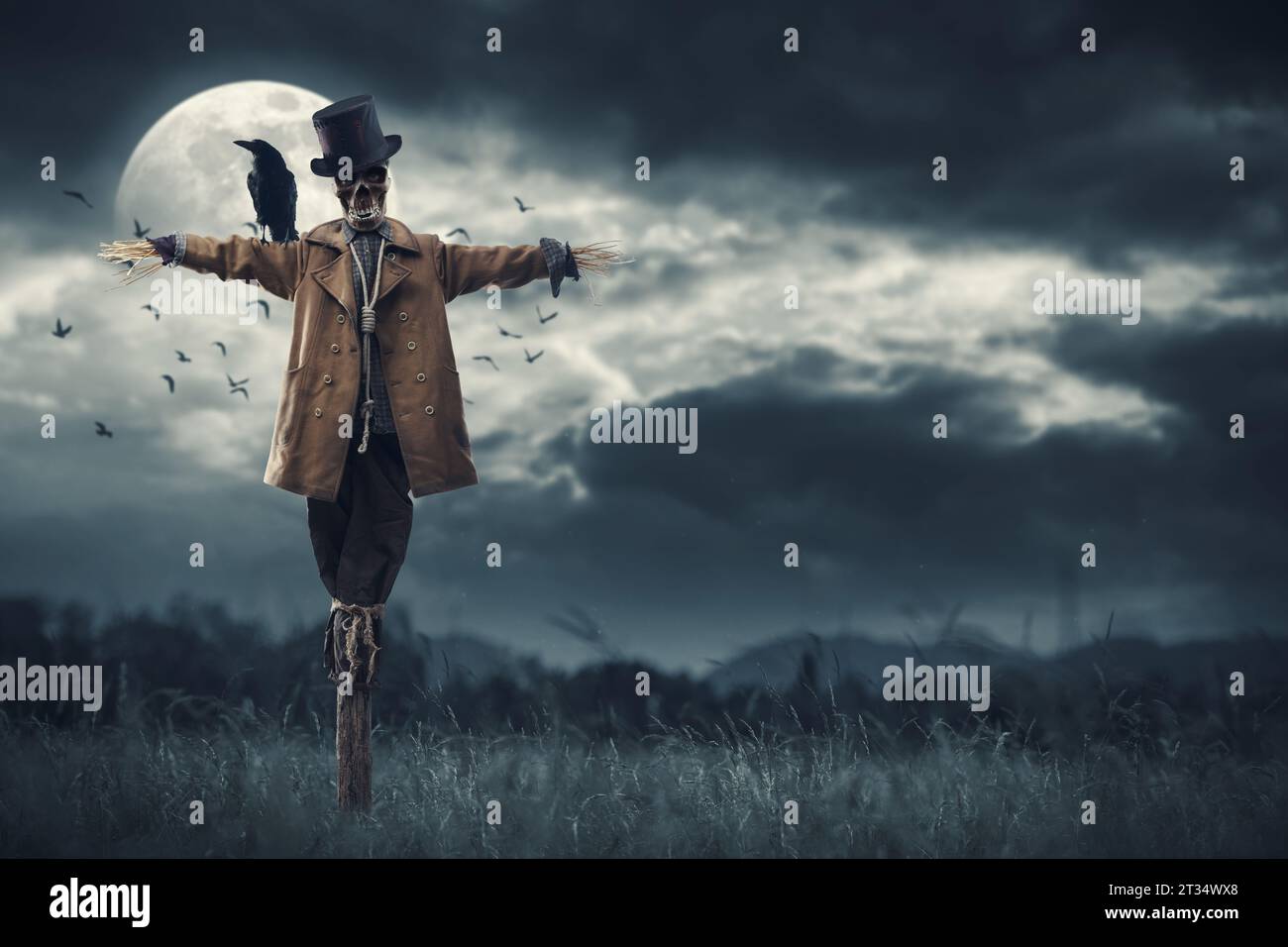 Creepy scarecrow with crow on his shoulder and full moon in the night ...