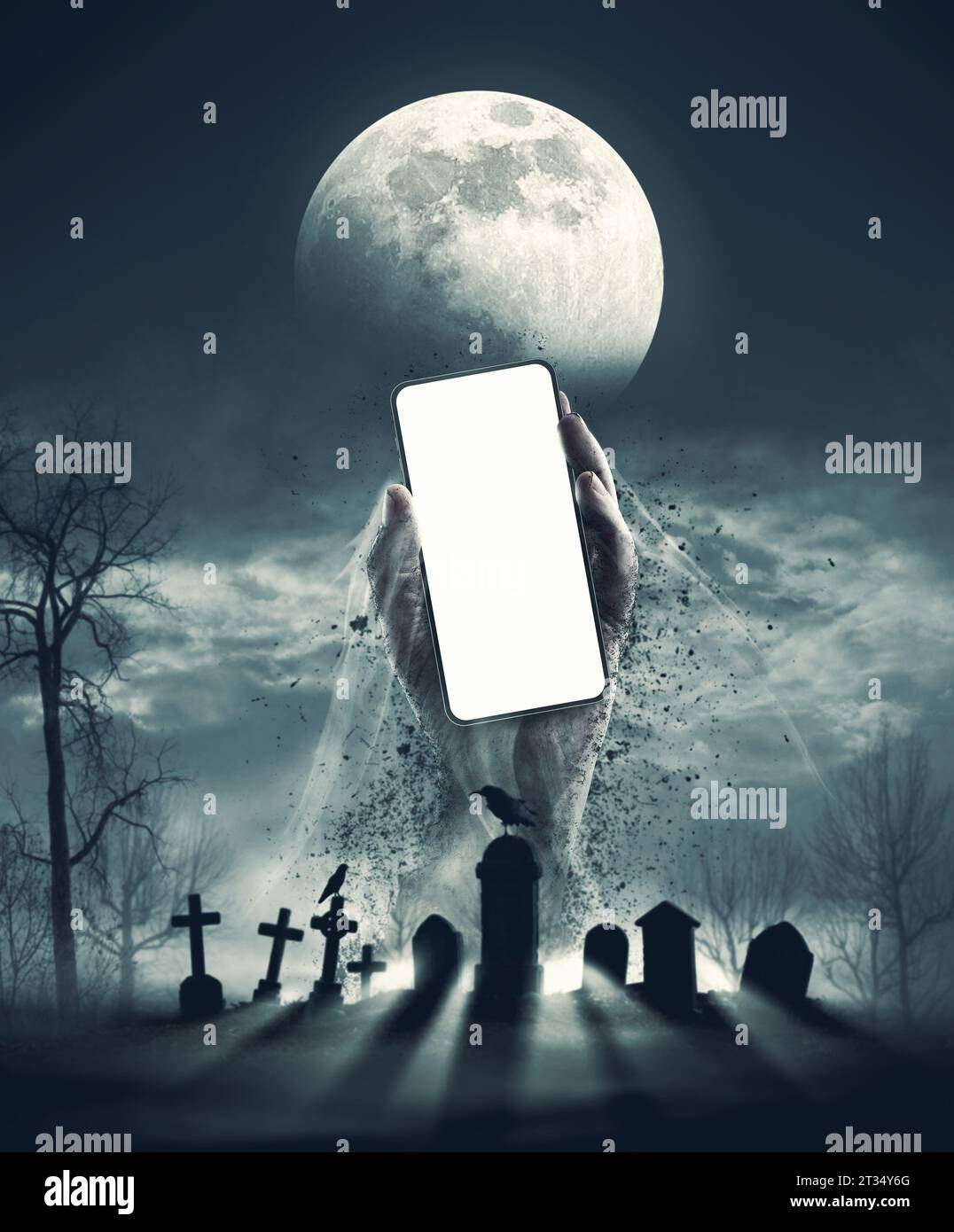 Scary zombie hand coming out of a grave and holding a smartphone with ...