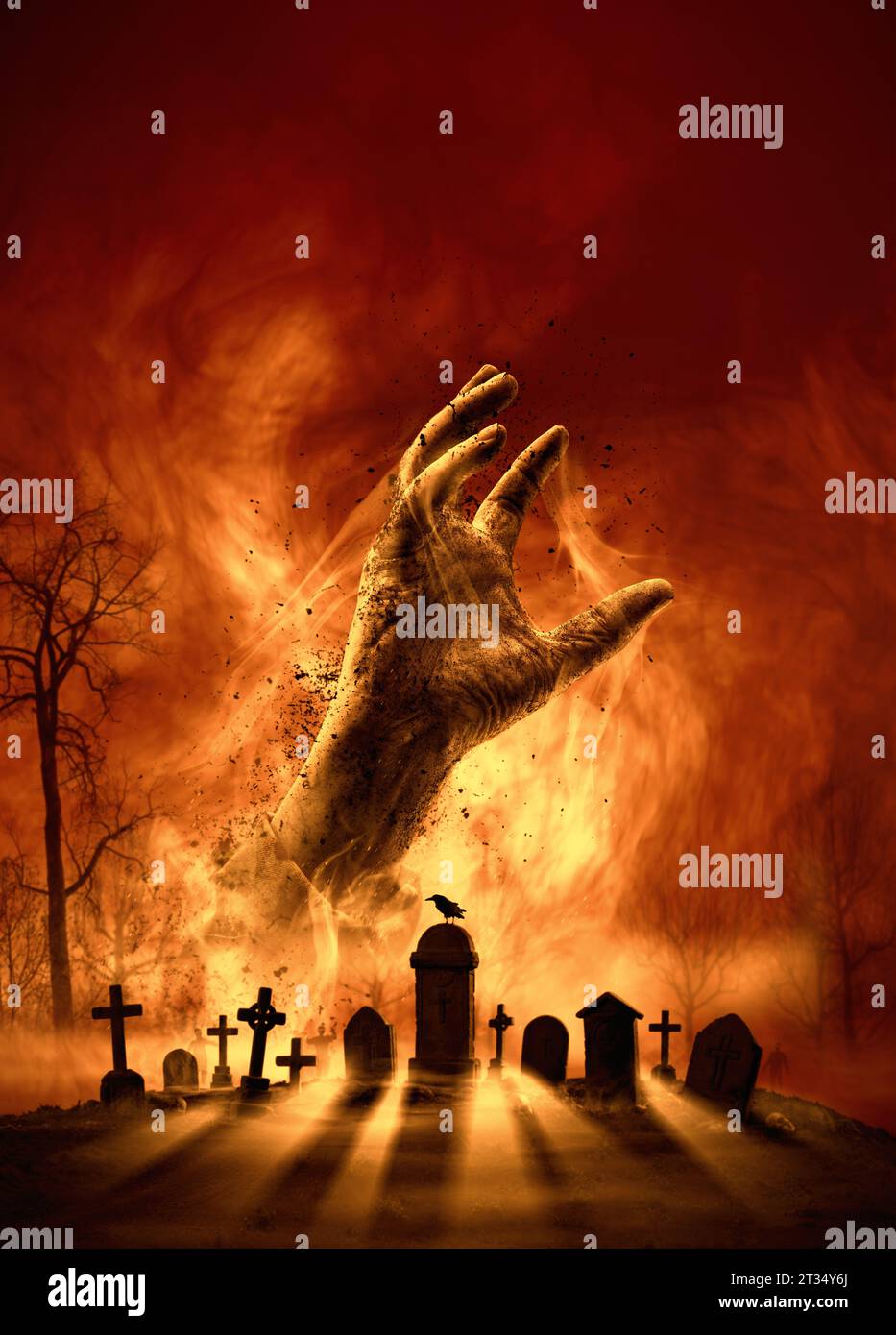 Creepy zombie hand rising in the night sky and old scary graveyard ...