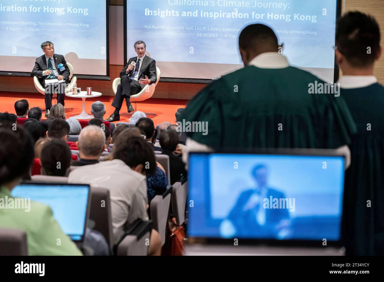 California Gov. Gavin Newsom, right, speaks next to Professor Peng Gong ...