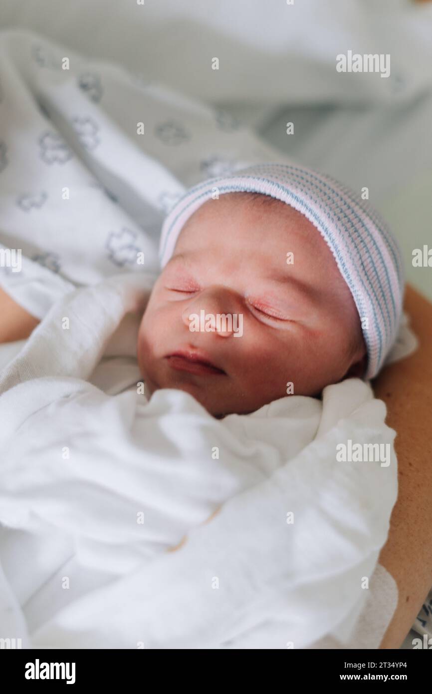 Portrait of a one day old newborn baby in the hospital Stock Photo - Alamy
