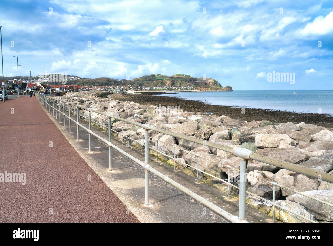 Looking south to Little Orme from Penrhyn Beach, promenade. Sea front ...