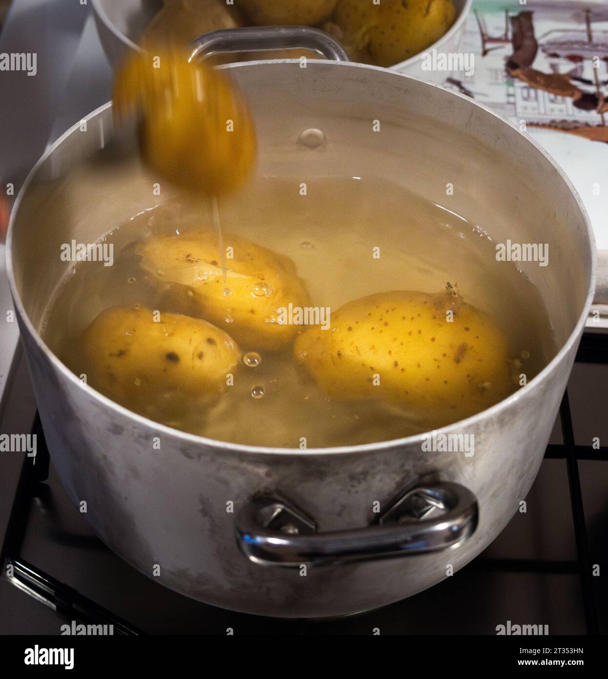 Cooking potatoes in hot water hi-res stock photography and images - Alamy