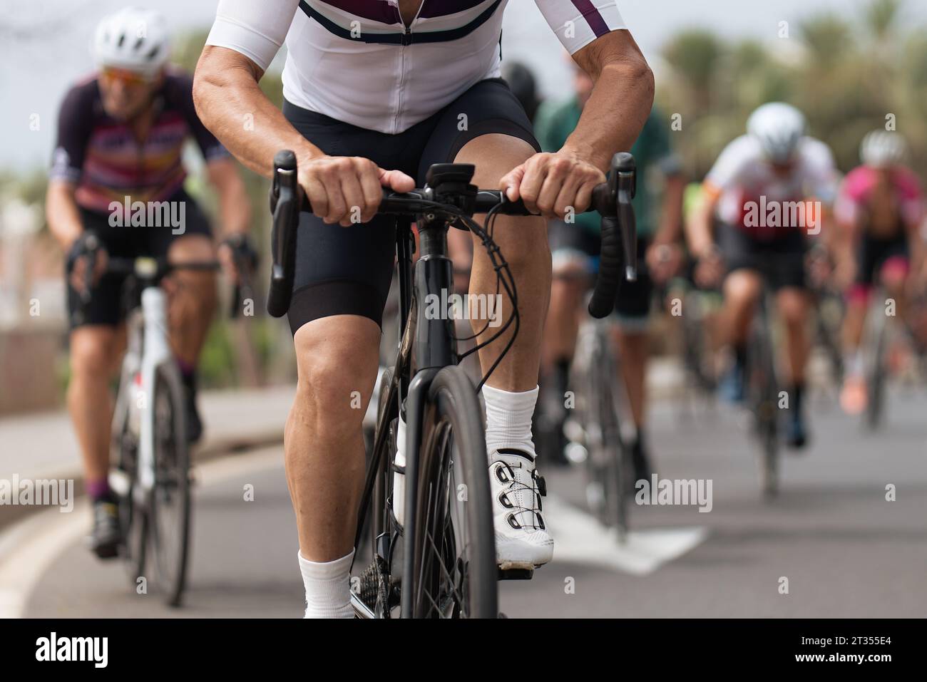 Cycling competition, cyclist athletes riding a race Stock Photo - Alamy