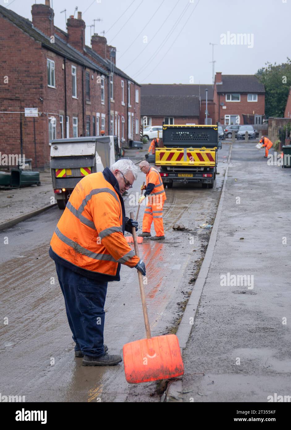 The clean up begins in Catcliffe near Rotherham, South Yorkshire, in ...