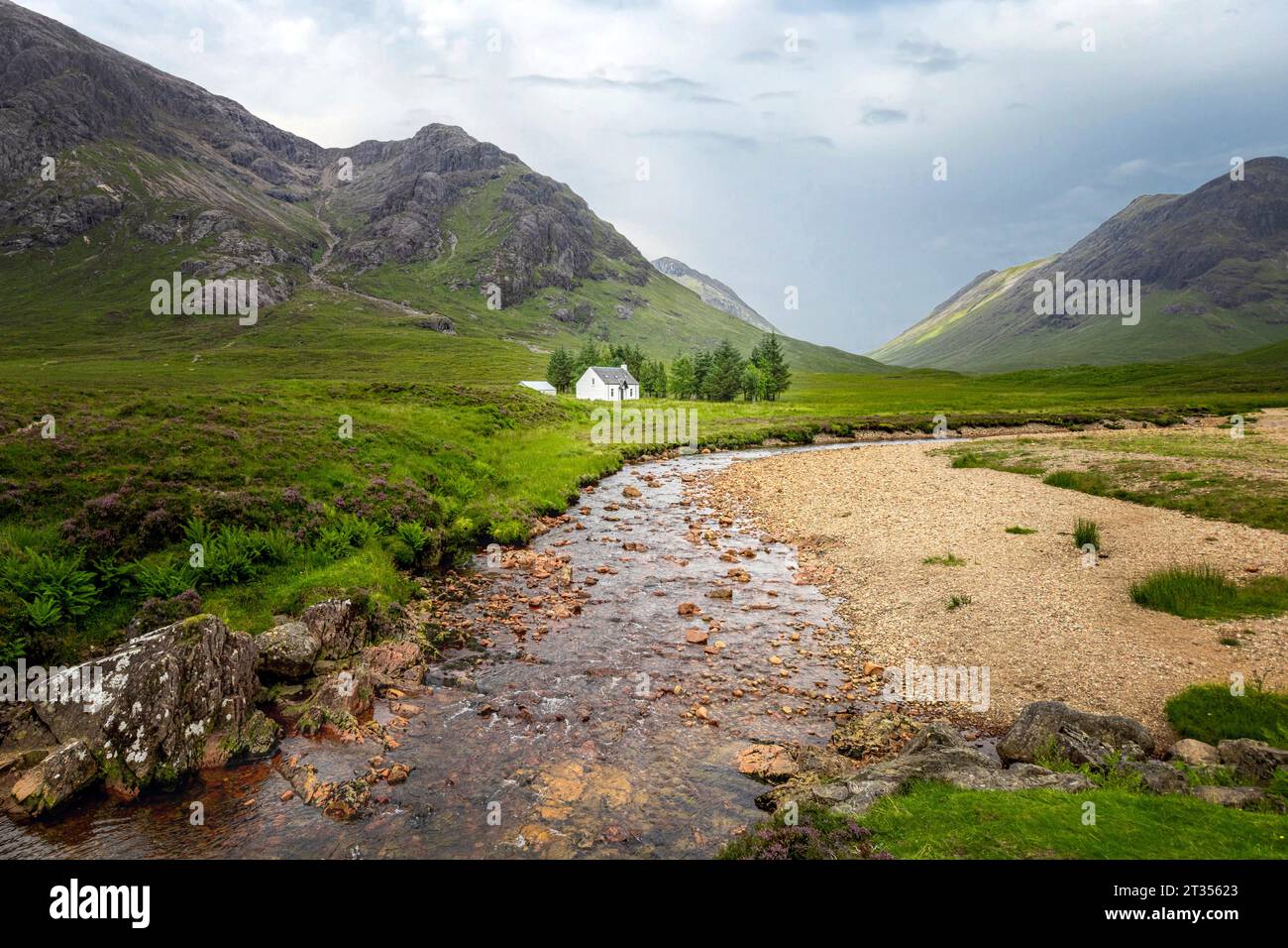 Lagangarbh Hut is a desolate white house sitting under the mountain ...