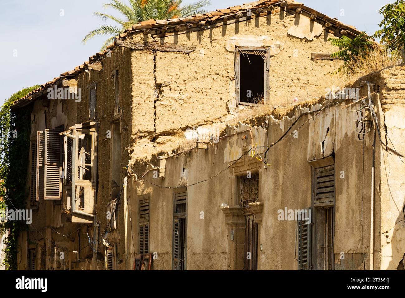 Abandoned, tumbledown old house in North Nicosia showing traditional ...