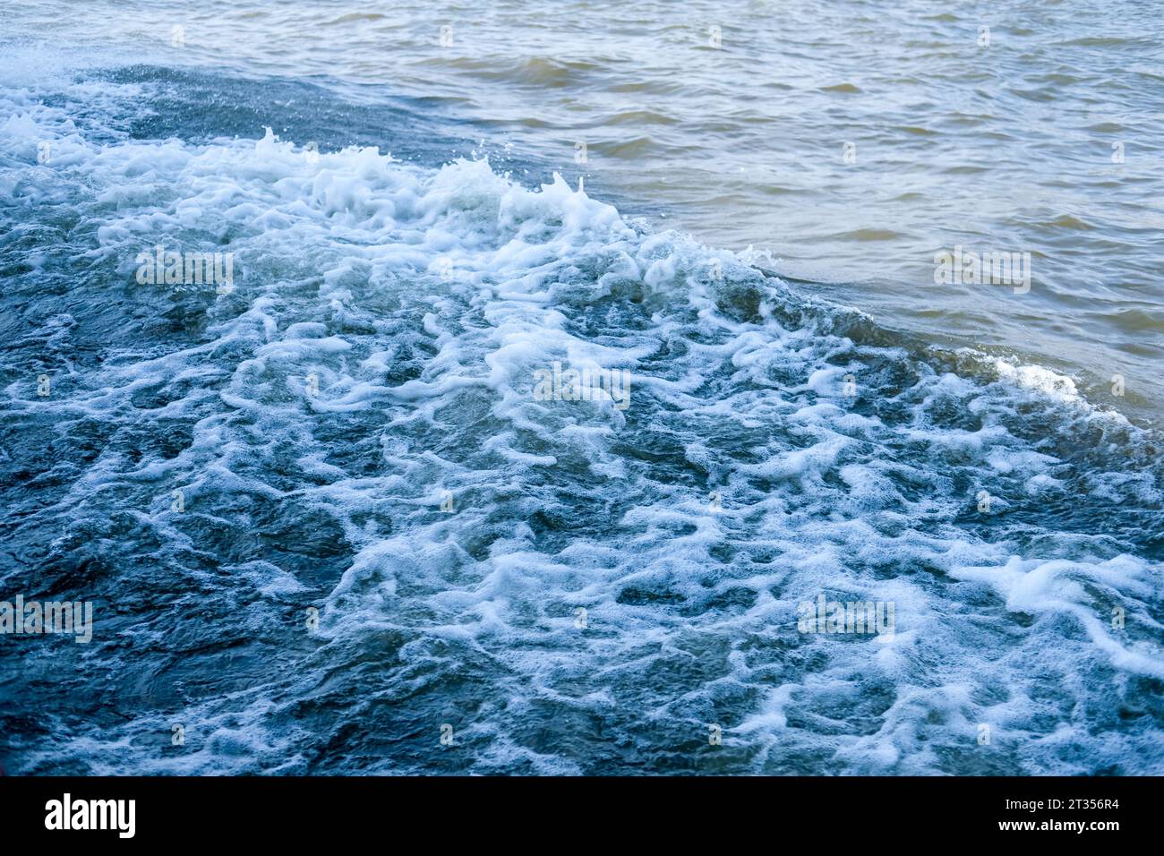 Blue wave water surface background Stock Photo - Alamy