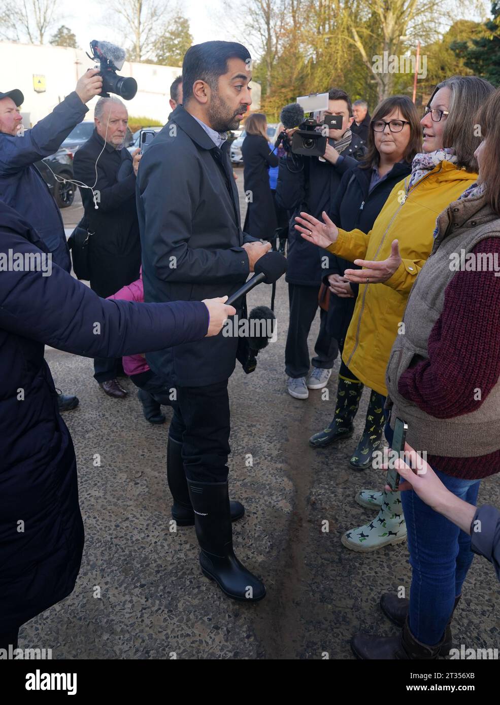 First Minister Humza Yousaf speaking with staff from Matrix ...