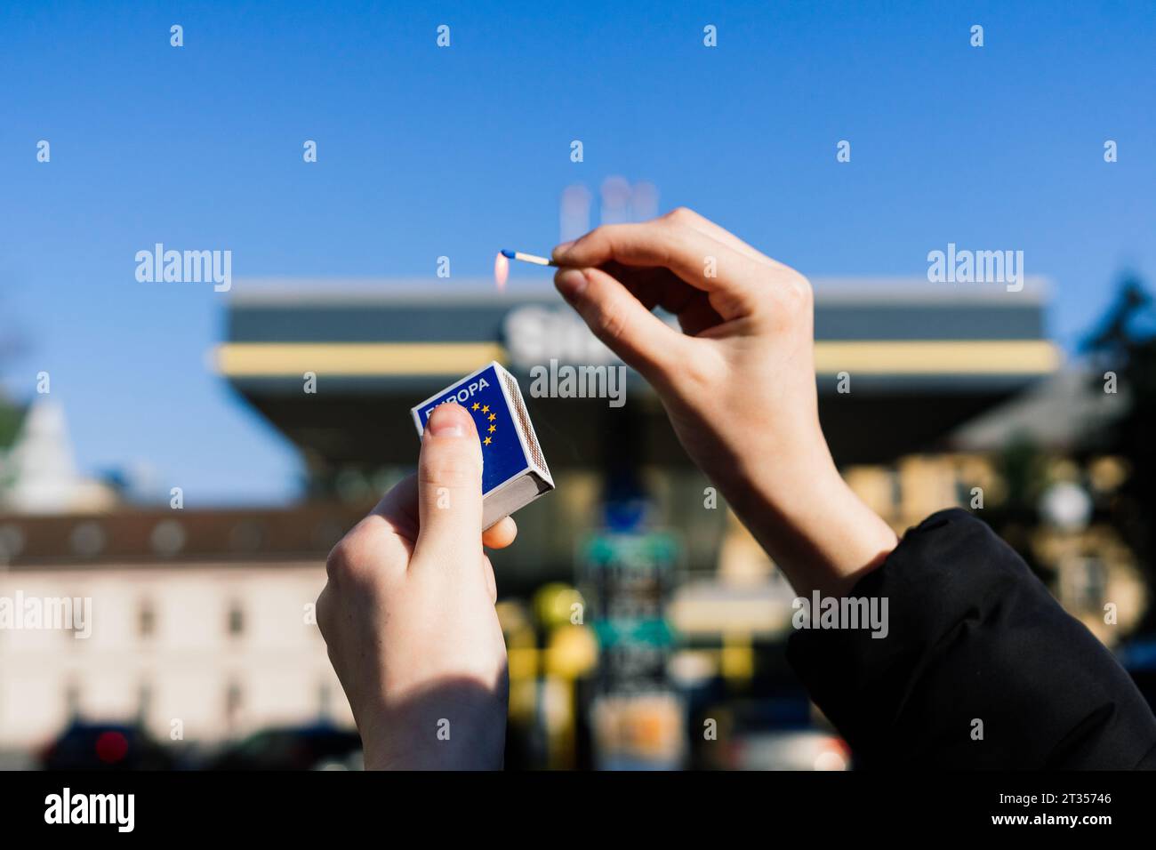 Set fire to spilled oil, drawing carefully flammable. Matches fire in ...