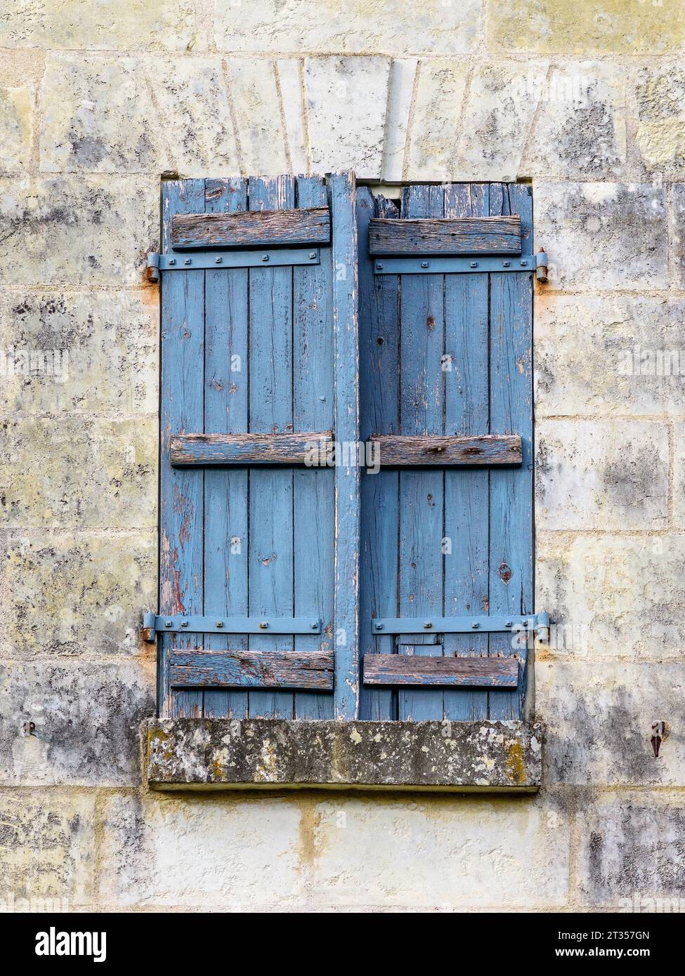 Wood window shutters in need of repainting - central France Stock Photo ...