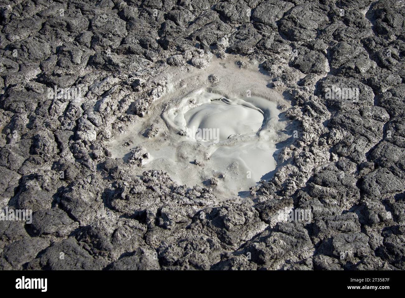 cones of mud volcanoes from which rivers of mud flow Stock Photo - Alamy
