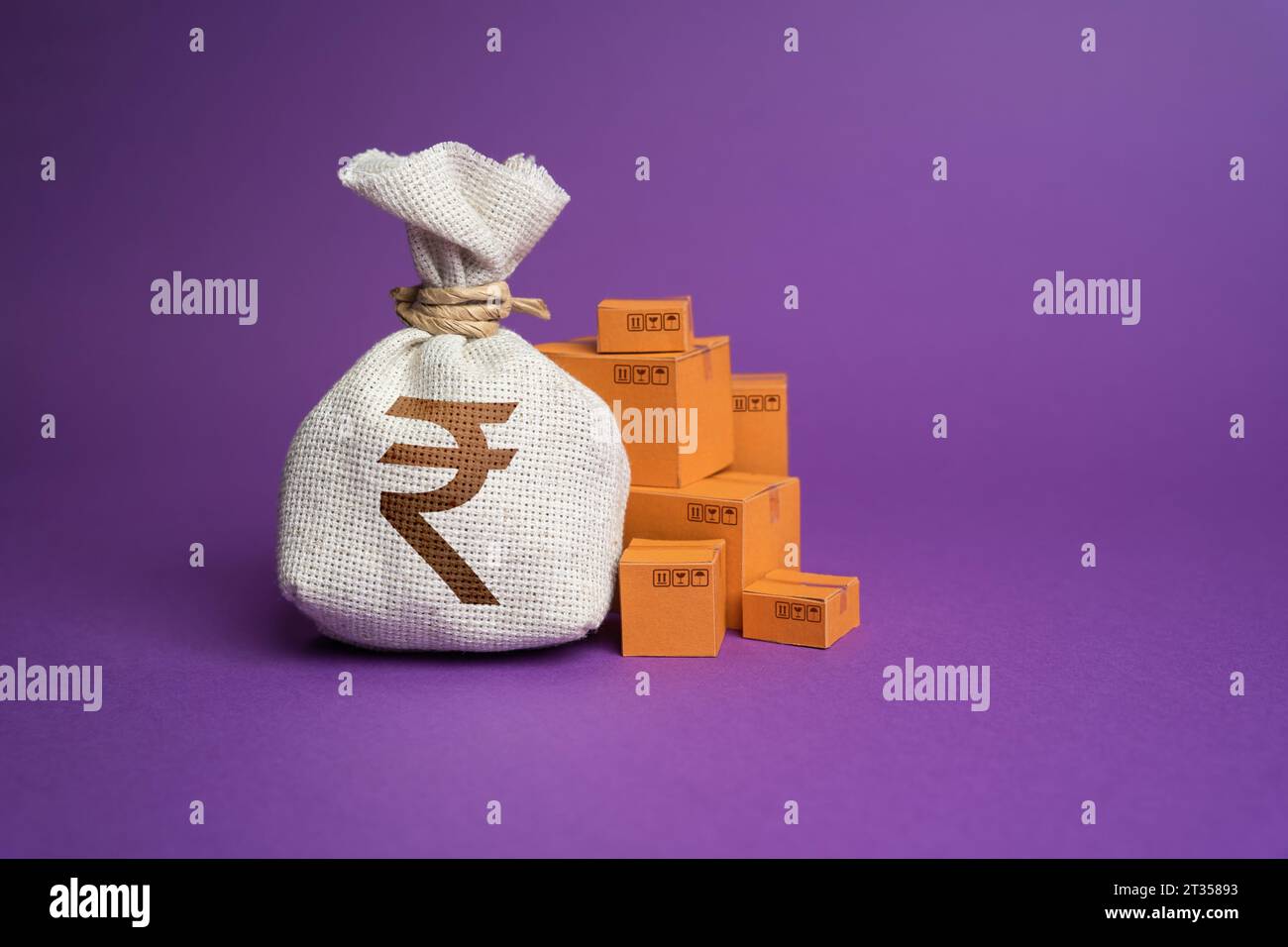 Goods boxes and indian rupee money bag. Budget purchases, large ...