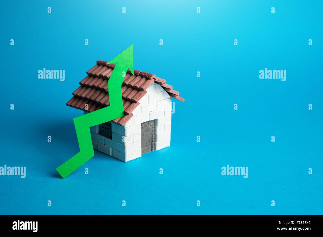House and green arrow up. Rising housing prices. Profitability of ...
