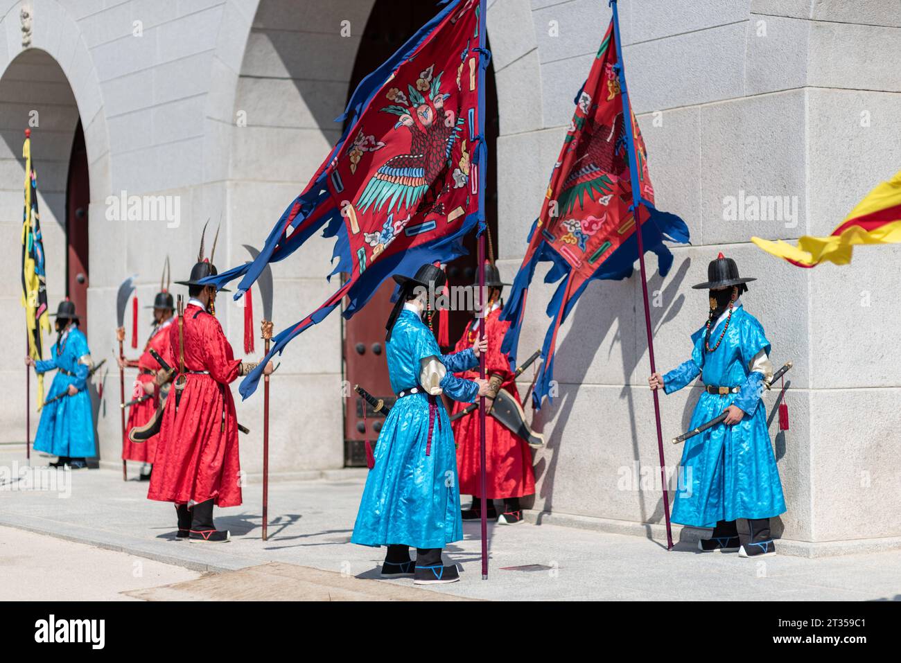 Korean royal guards in historical Joseon costumes in front of the ...