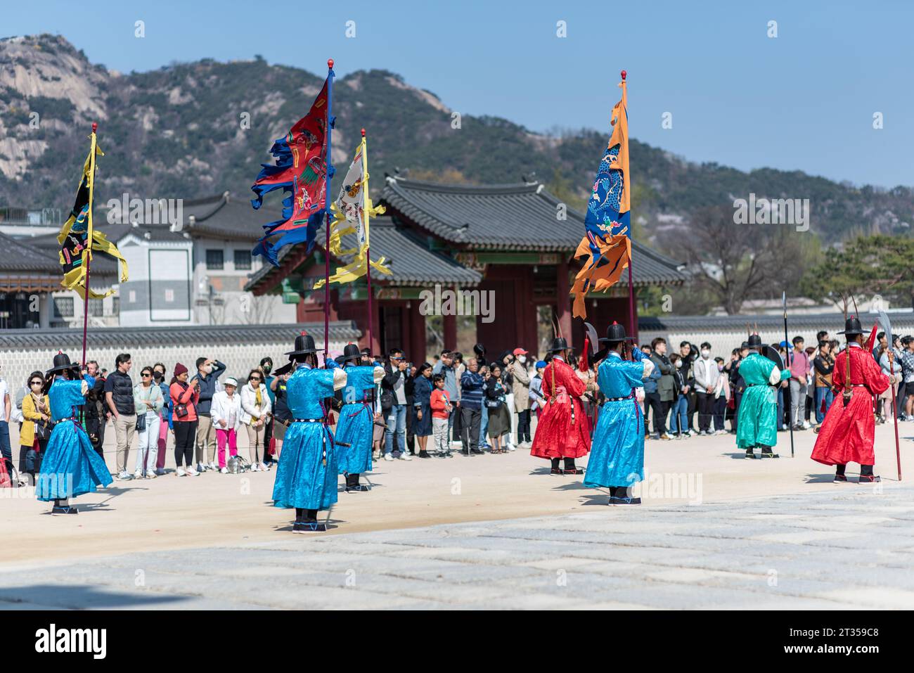 Korean royal guards in historical Joseon costumes in front of the ...