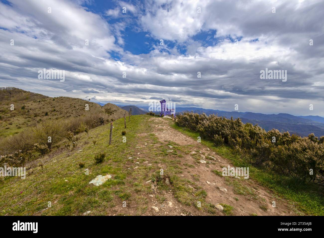 Purple big bench in the inland of Genoa in the countryside under a ...