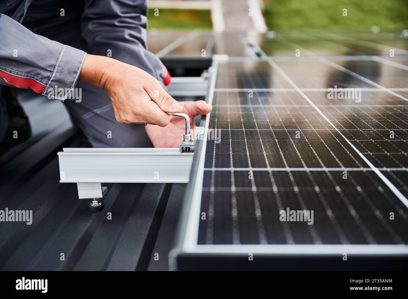 Professional installation of PV system on a roof. Close up view of ...