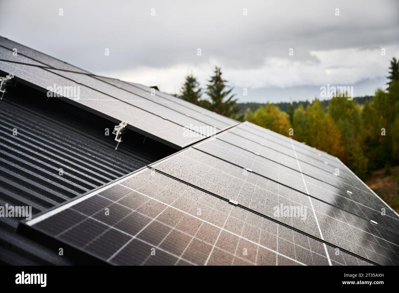 Solar photovoltaic panels on roof on a top of house after rain in ...
