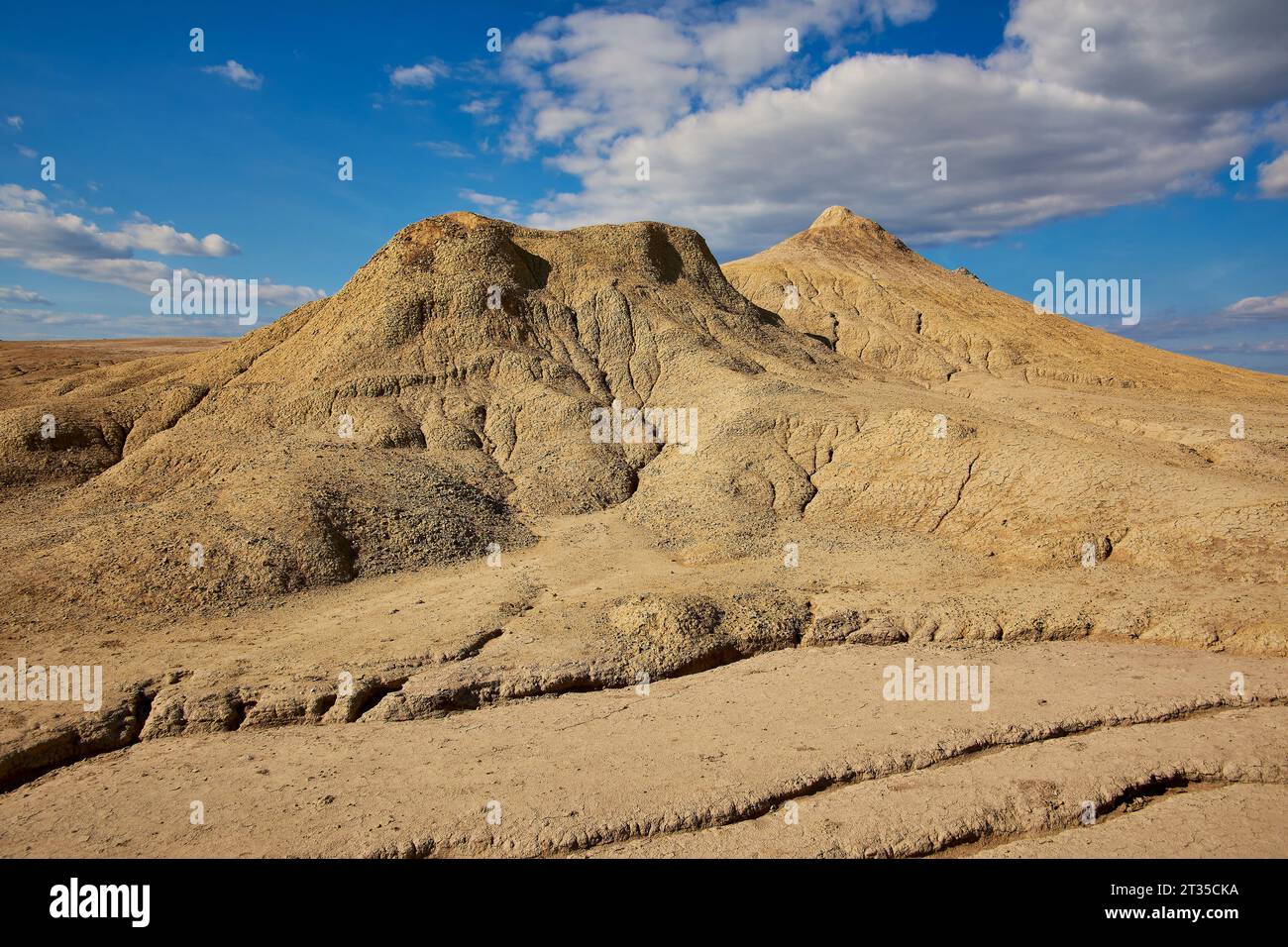 cones of mud volcanoes from which rivers of mud flow Stock Photo - Alamy