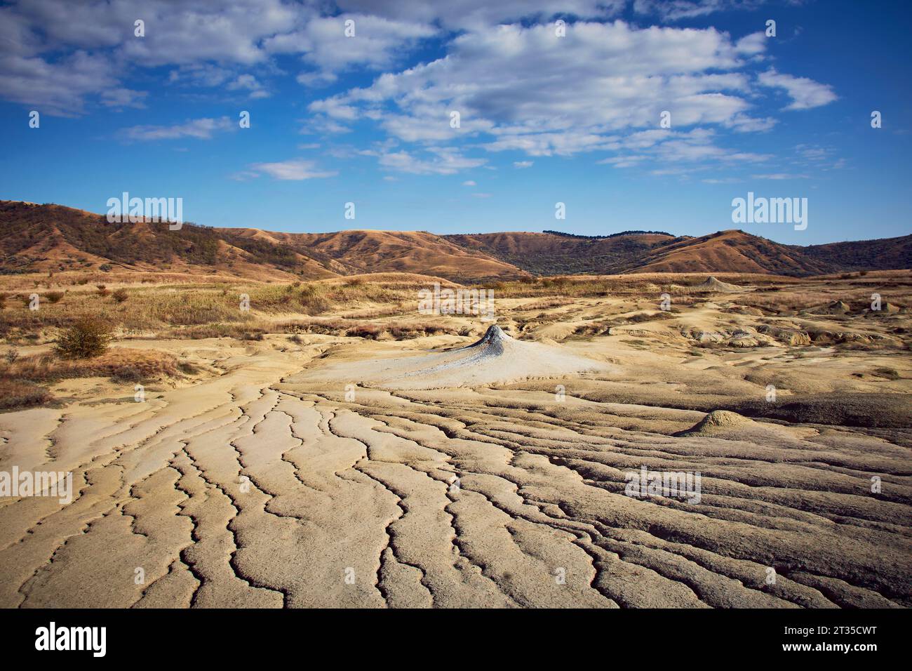 cones of mud volcanoes from which rivers of mud flow Stock Photo - Alamy