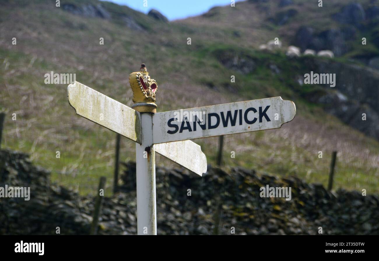 White Wooden Roadside Signpost with Gold Crown for Sandwick Bay on ...
