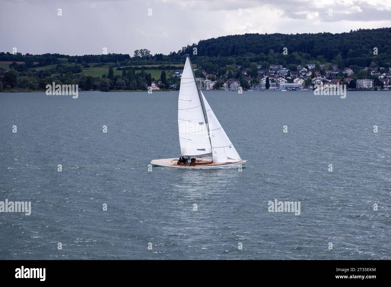 Lake Constance with a tilted sailing boat at full speed Stock Photo - Alamy