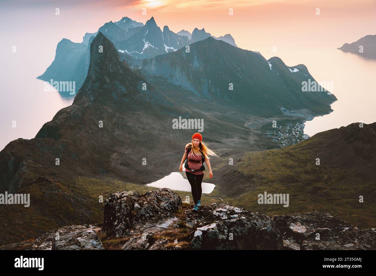 Woman hiking solo in Norway travel outdoor healthy lifestyle active ...