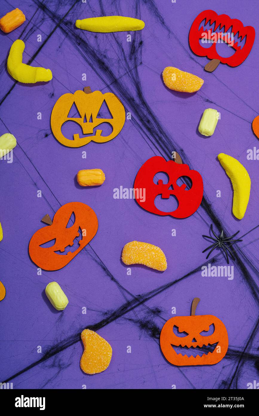 Funny Halloween background. Scary spider web, traditional fall pumpkins ...