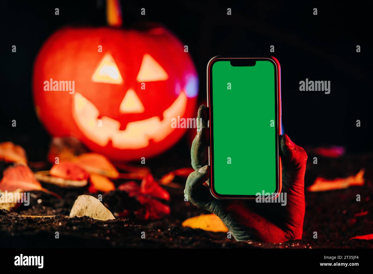 Zombie hand with smartphone.Undead,halloween pumpkin,mobile operator ...