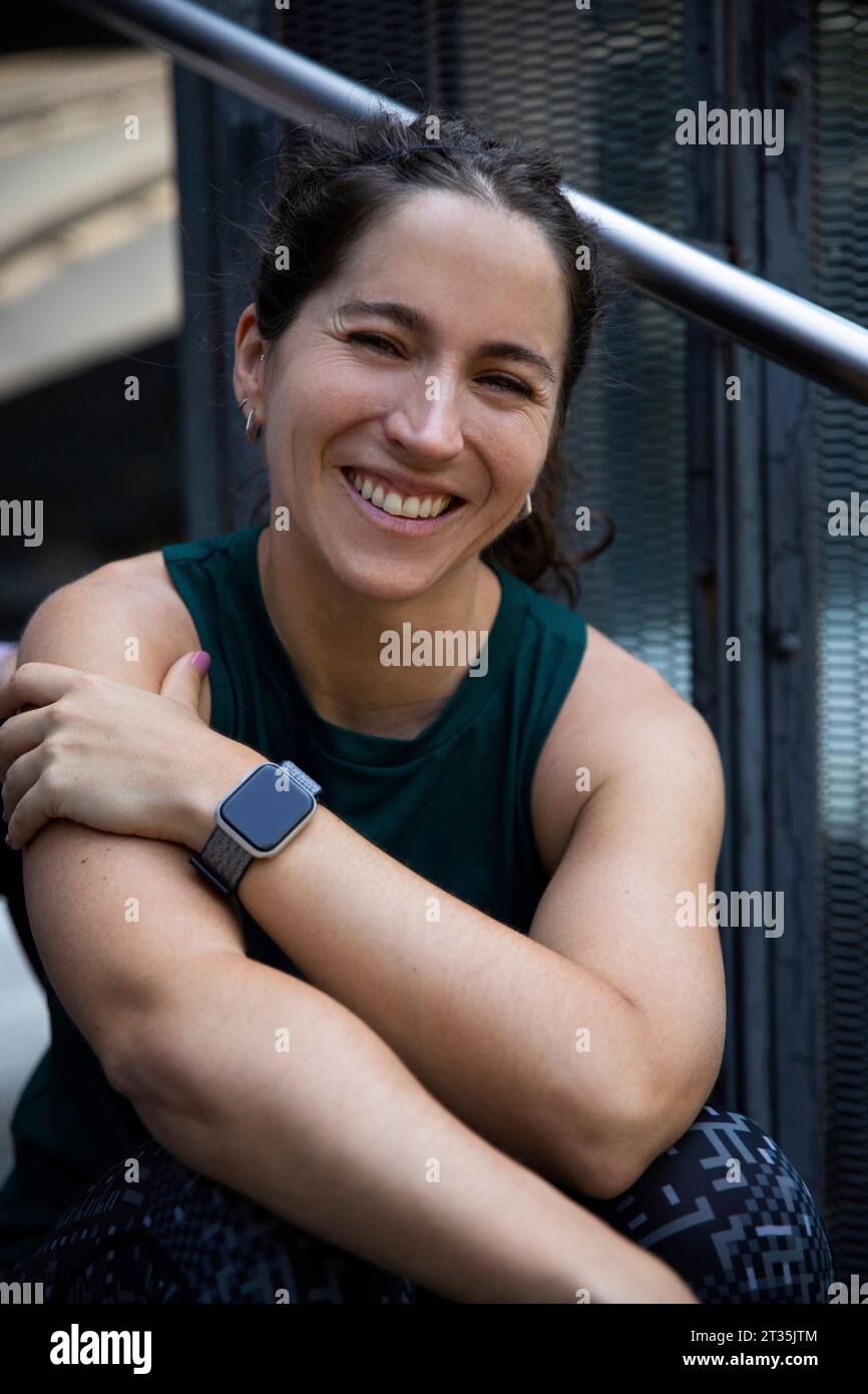 Happy woman wearing smartwatch hi-res stock photography and images - Alamy