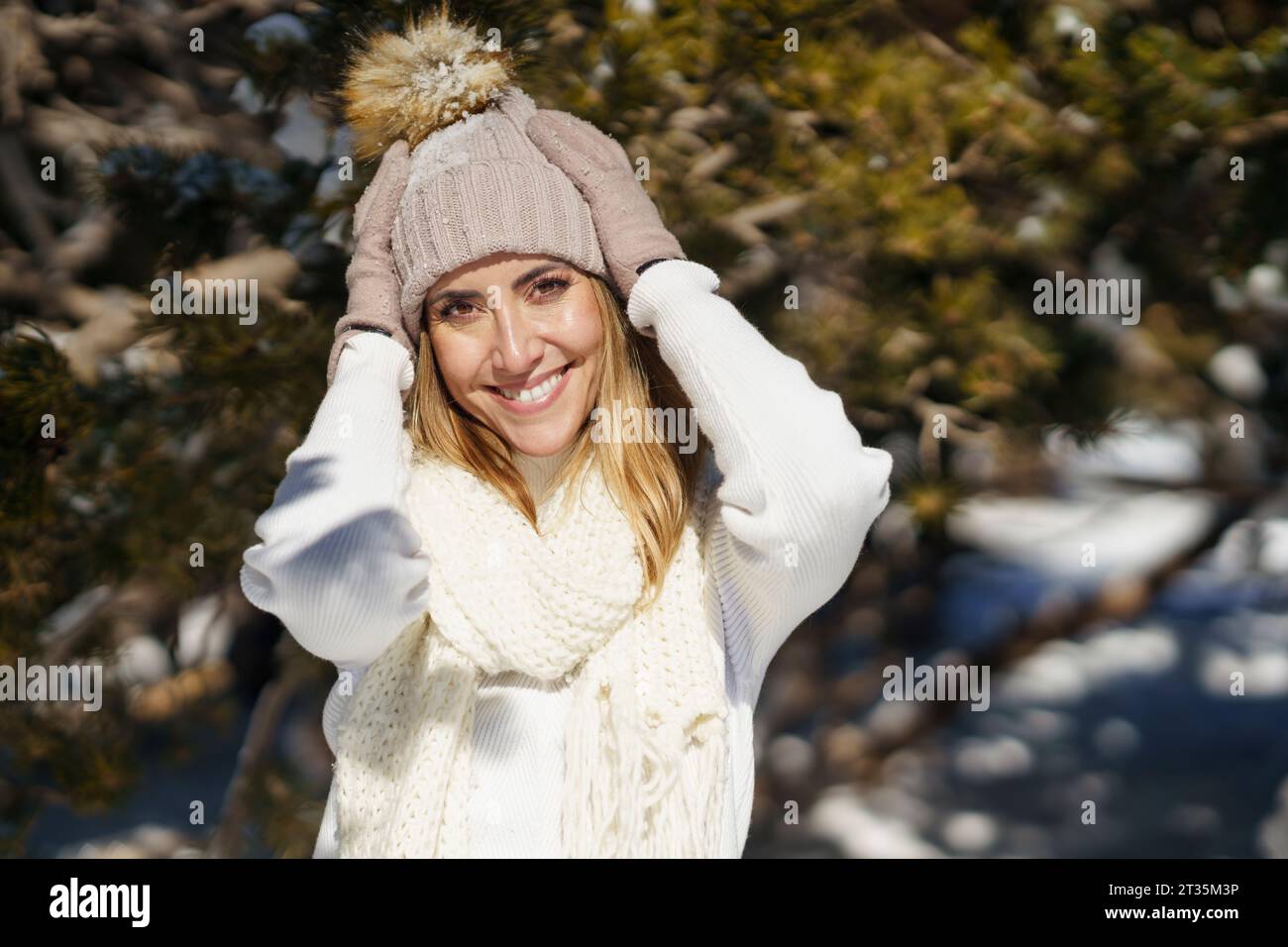Adjusting woman in light hi-res stock photography and images - Alamy