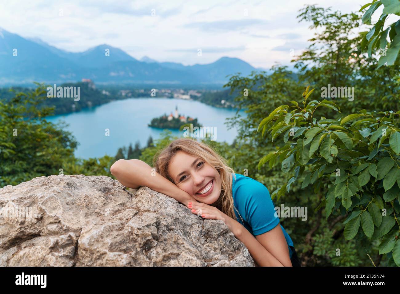 Woman resting on rock hi-res stock photography and images - Alamy