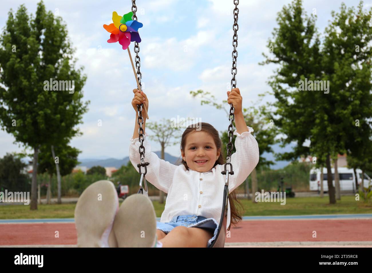 Child swinging asia hi-res stock photography and images - Alamy
