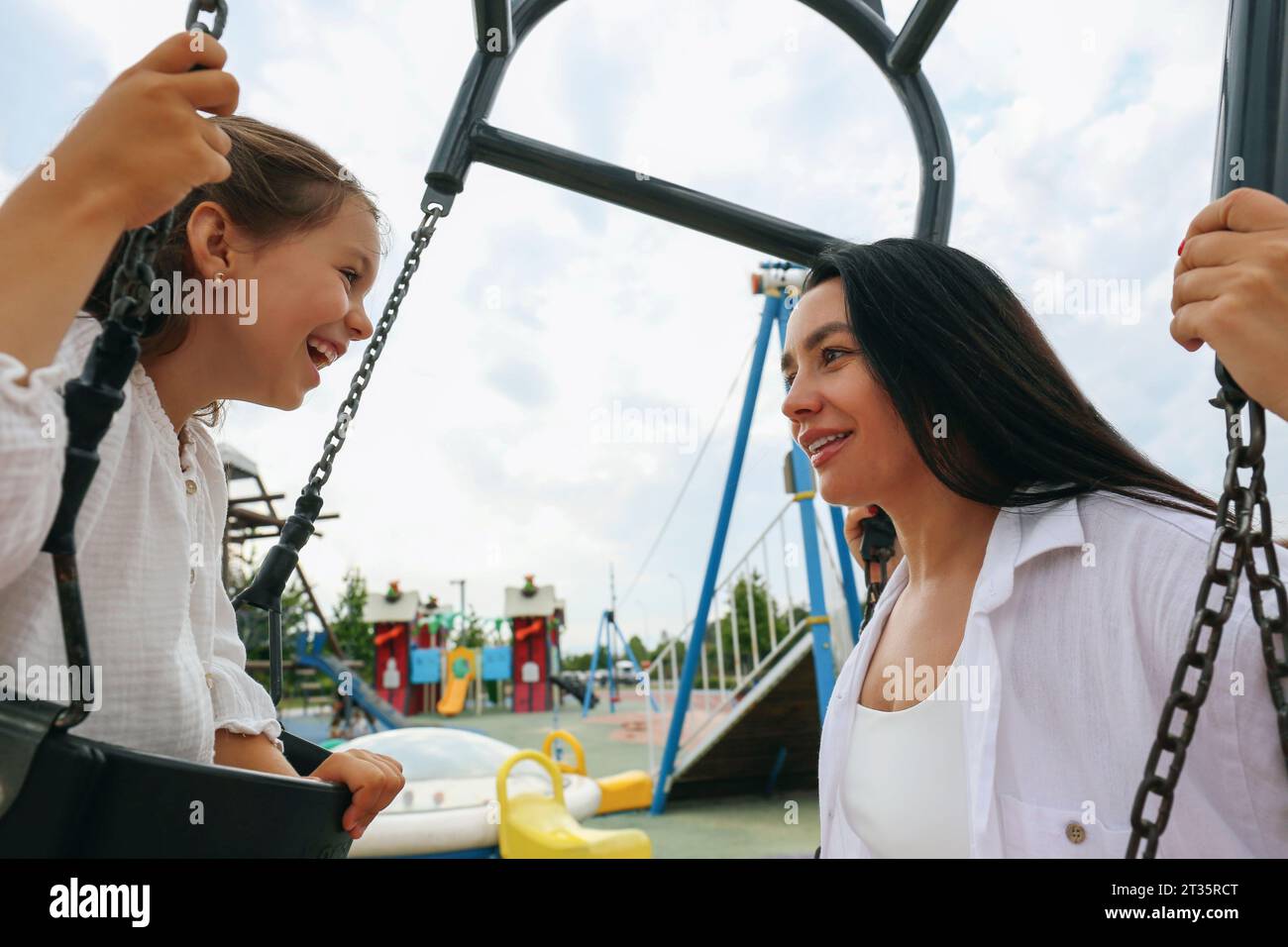 Mother daughter on swing hi-res stock photography and images - Alamy