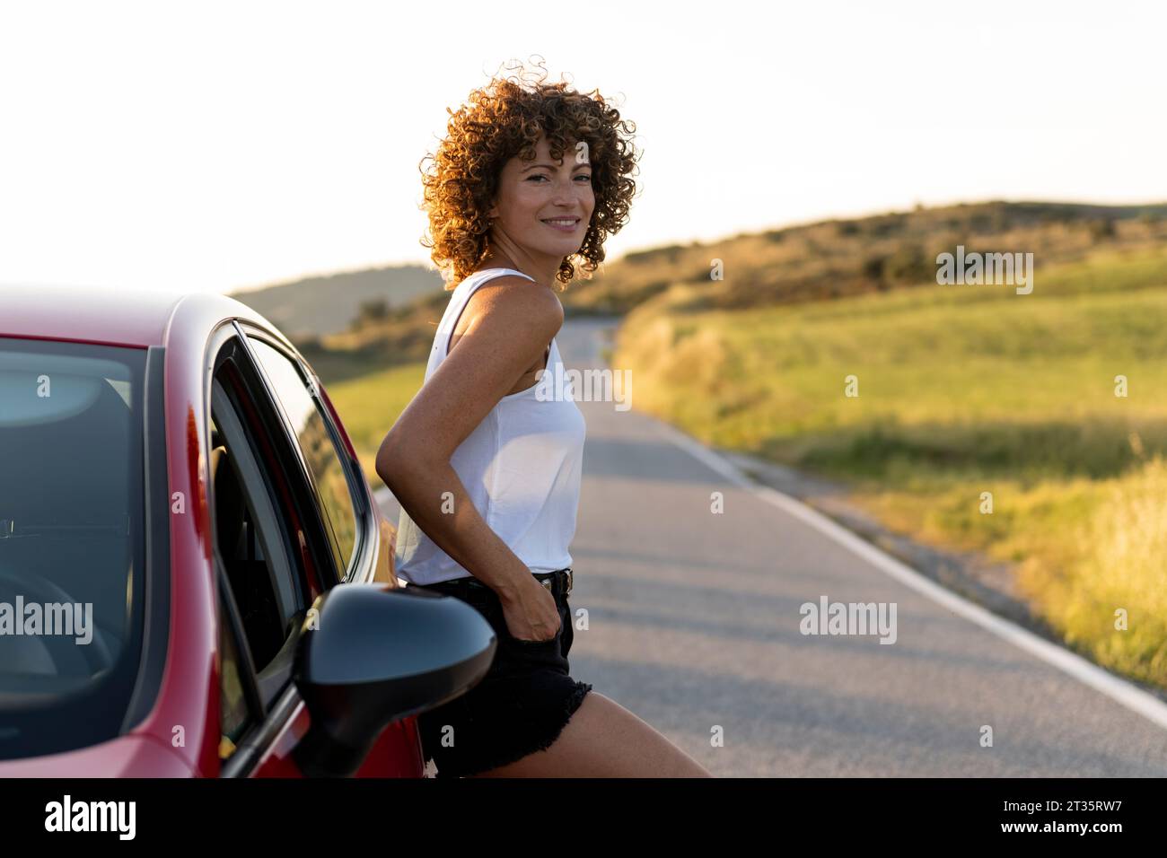 Woman red car hi-res stock photography and images - Alamy