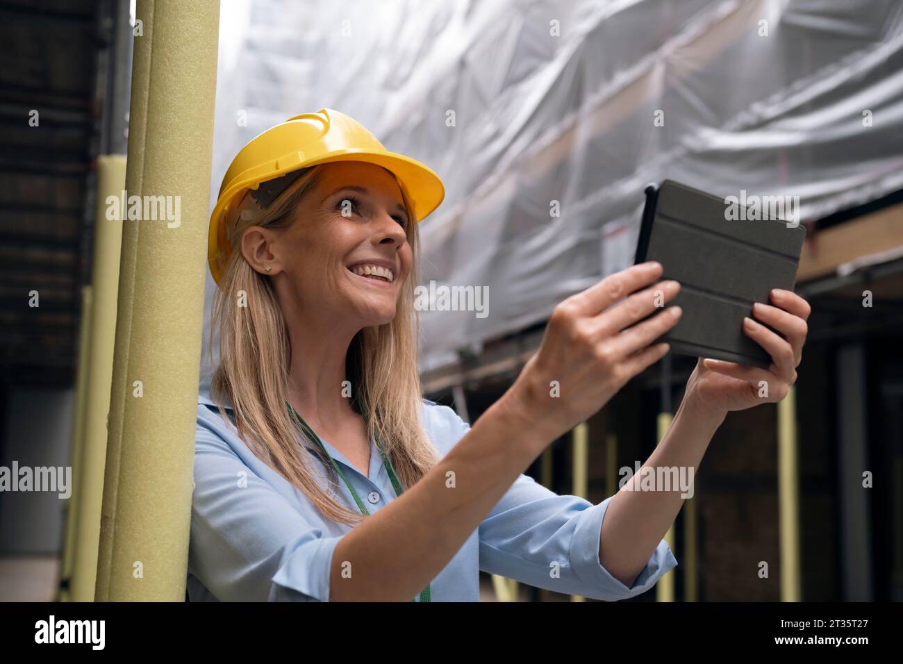 Male construction hard hat leaning hi-res stock photography and images ...