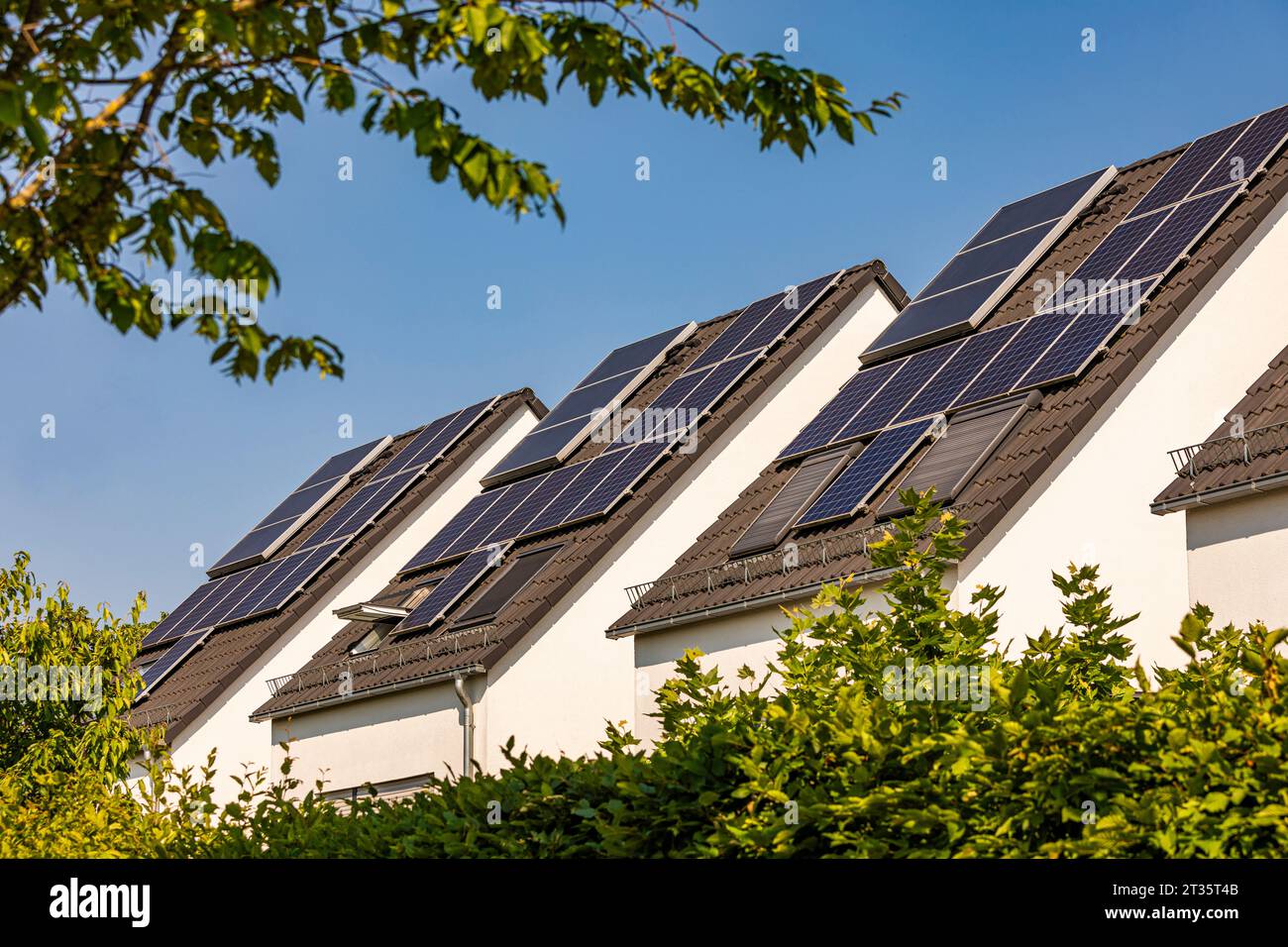 Germany, Baden-Wurttemberg, Solar panels on roofs of modern suburban ...