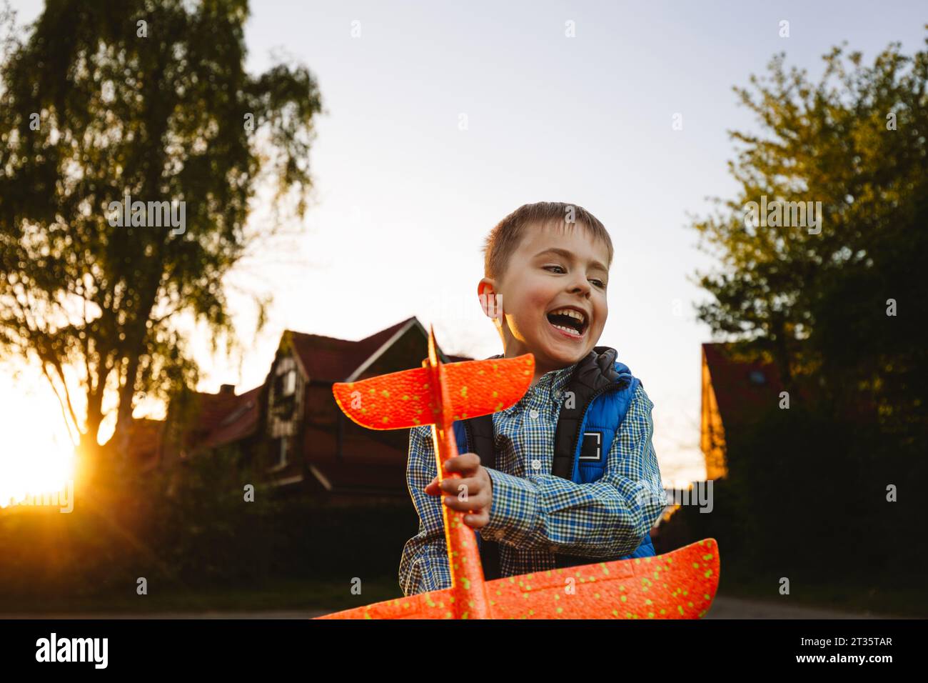 Child building airplane model hi-res stock photography and images - Alamy