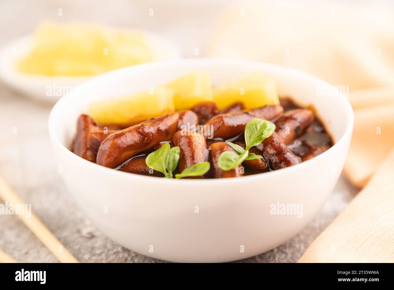Tteokbokki or Topokki, fried rice cake stick, popular Korean street ...