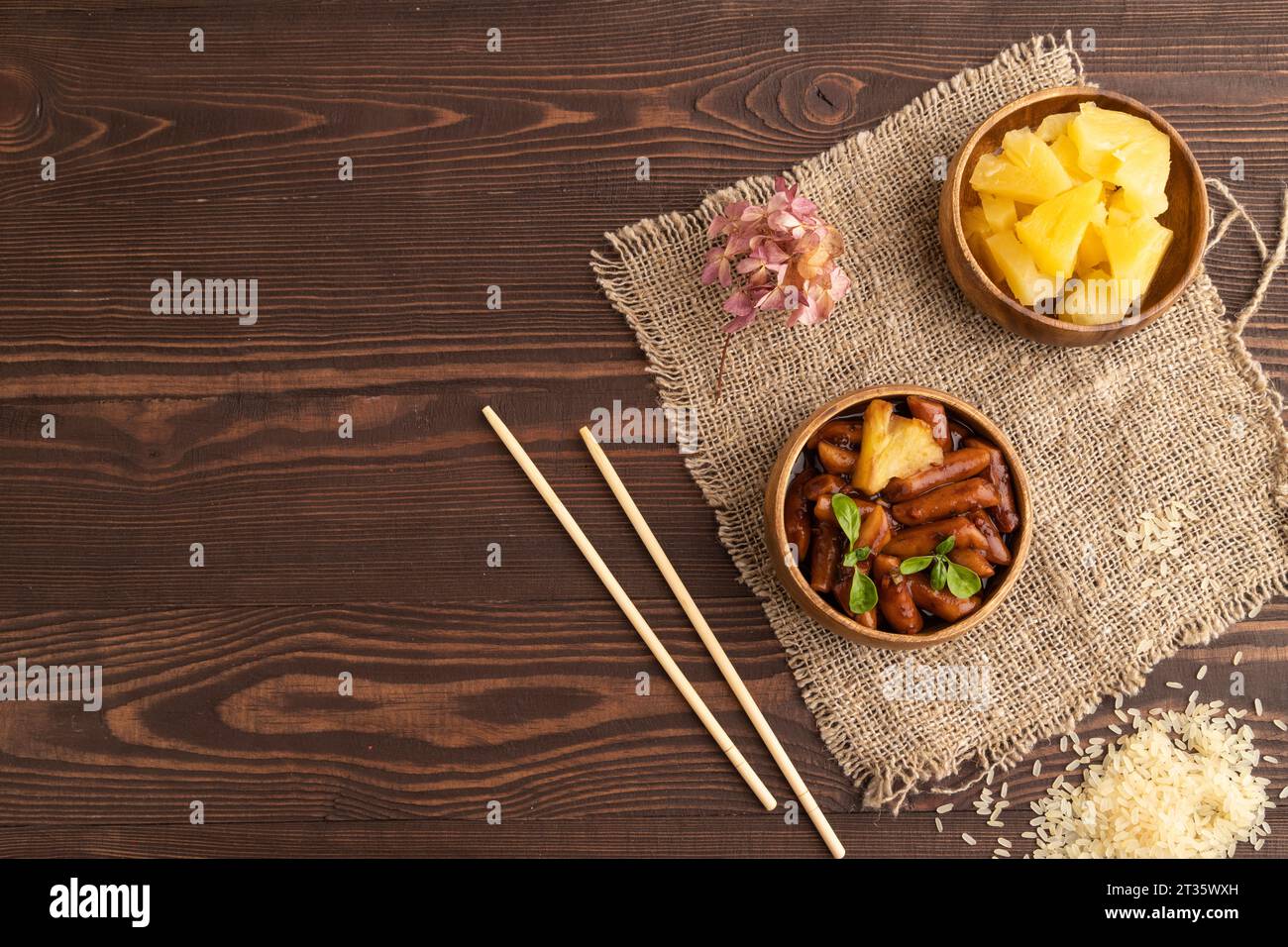 Tteokbokki or Topokki, fried rice cake stick, popular Korean street ...