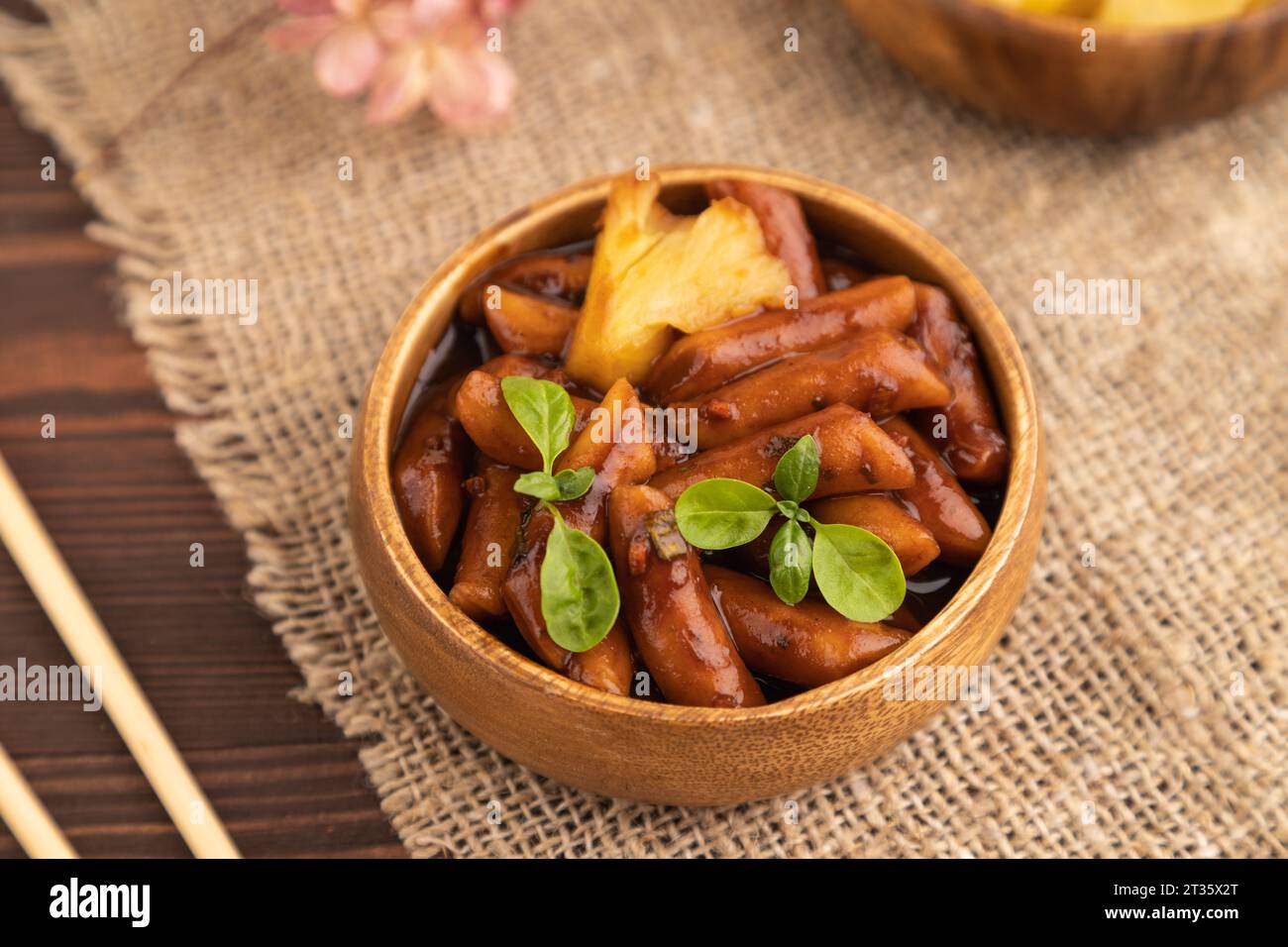 Tteokbokki or Topokki, fried rice cake stick, popular Korean street ...
